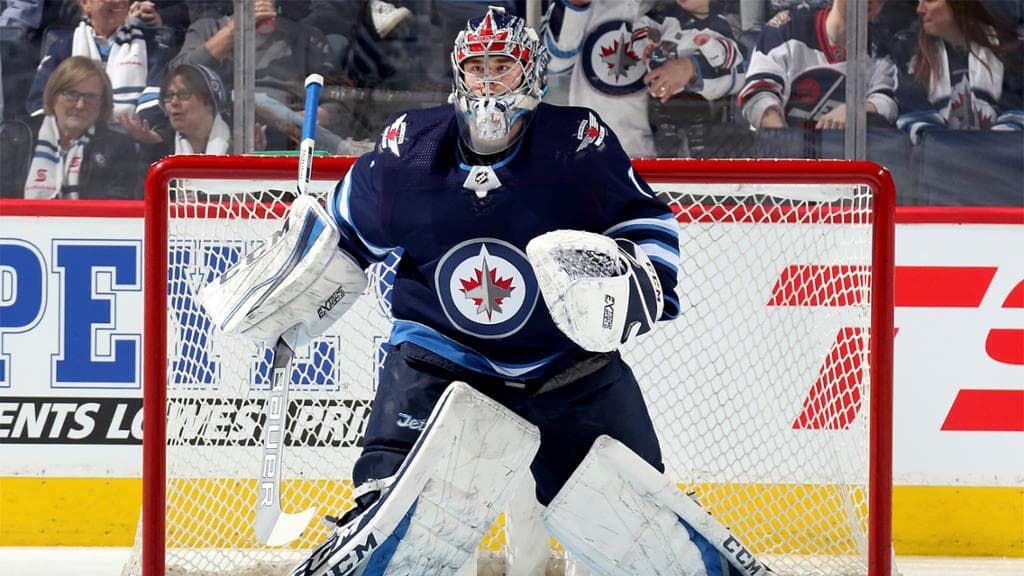 Eric Comrie returns to the Winnipeg Jets for his fourth tour of duty